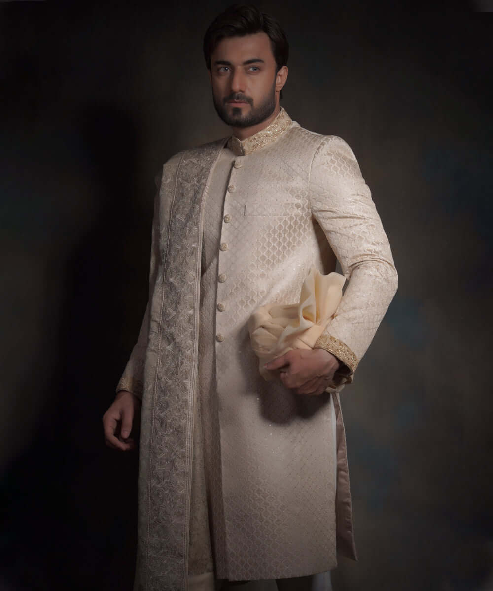 Embroidered Gold Pakistani Groom Sherwani in Raw Silk – Nameera by Farooq