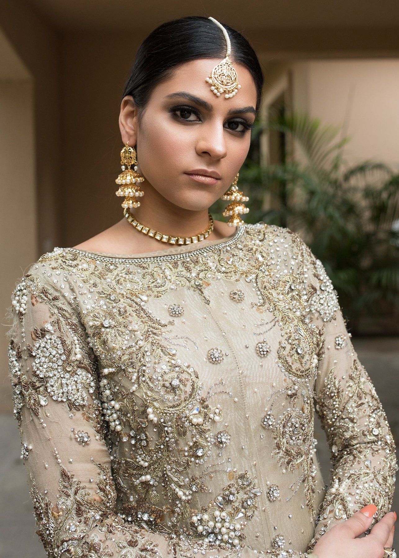 Designer gown dress embroidered in dust gold color – Nameera by Farooq